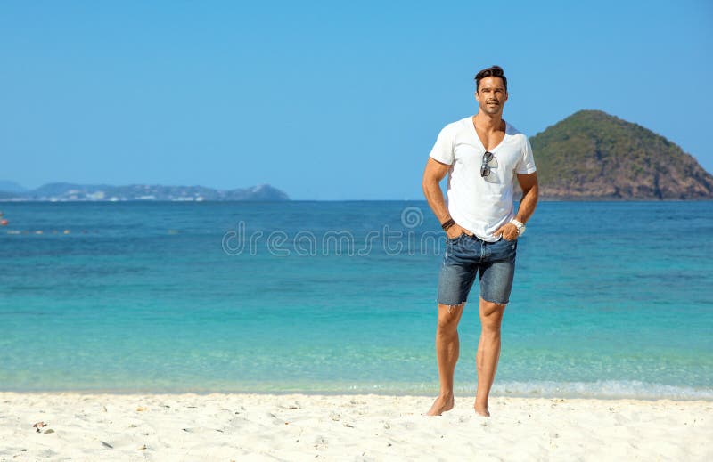 Handsome, Muscular Man Relaxing on a Tropical Beach Stock Image - Image ...