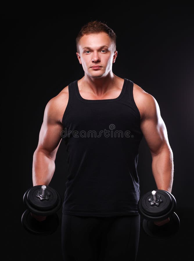 Handsome Muscular Man Working Out with Dumbbells Stock Photo - Image of ...