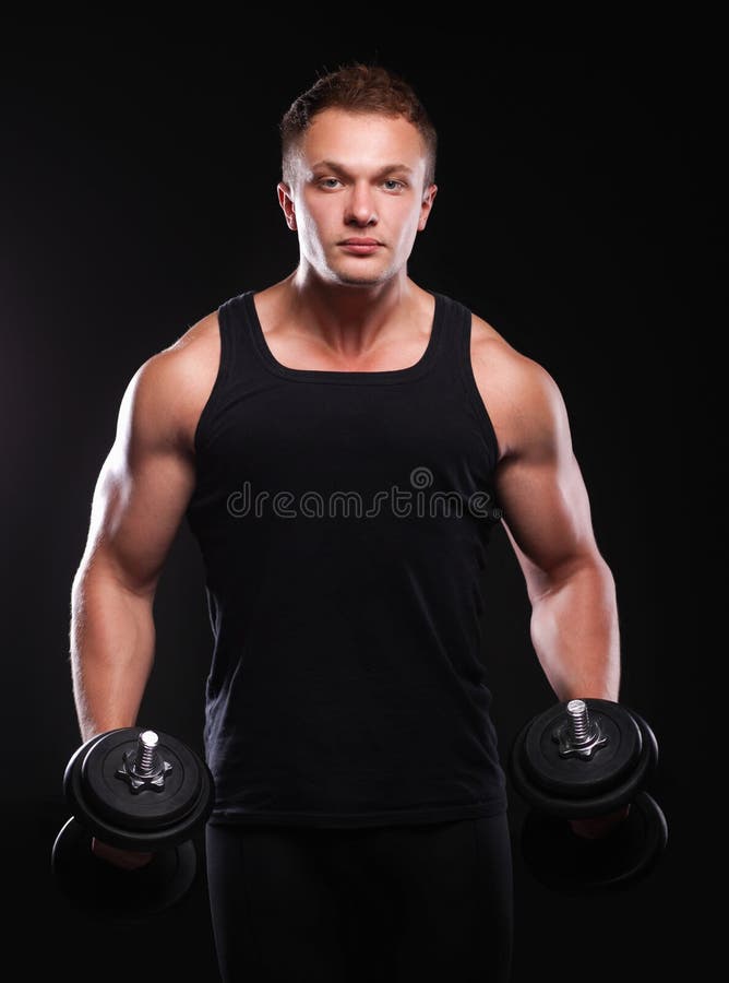 Handsome Muscular Man Working Out with Dumbbells Stock Image - Image of ...