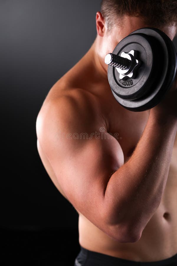 Handsome Muscular Man Working Out with Dumbbells Stock Photo - Image of ...