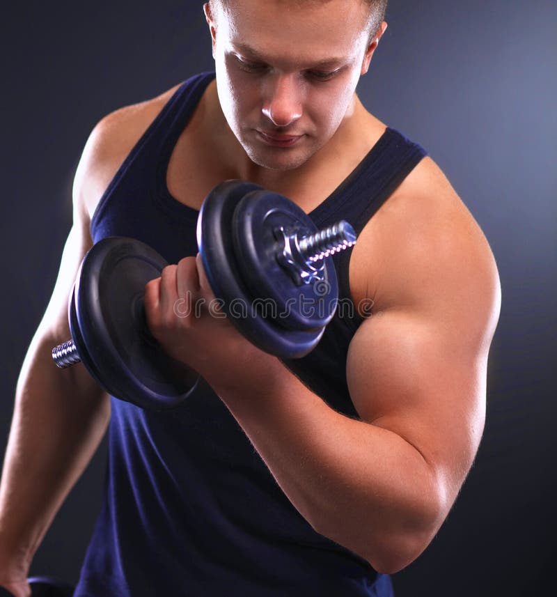 Handsome Muscular Man Working Out with Dumbbells Stock Image - Image of ...