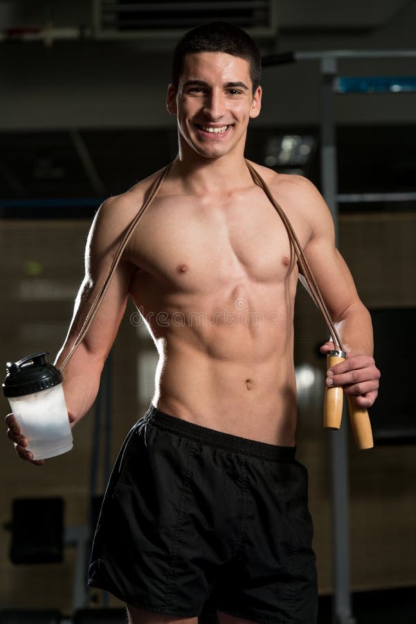Handsome Muscular Men with Jumping Rope Stock Photo - Image of sport ...