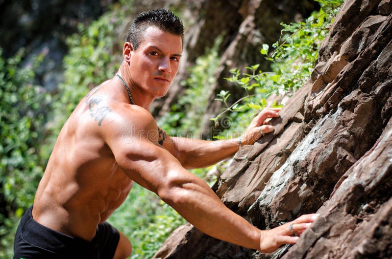 Handsome, Muscular, Shirless Climber Climbing Rock Wall Stock Image ...