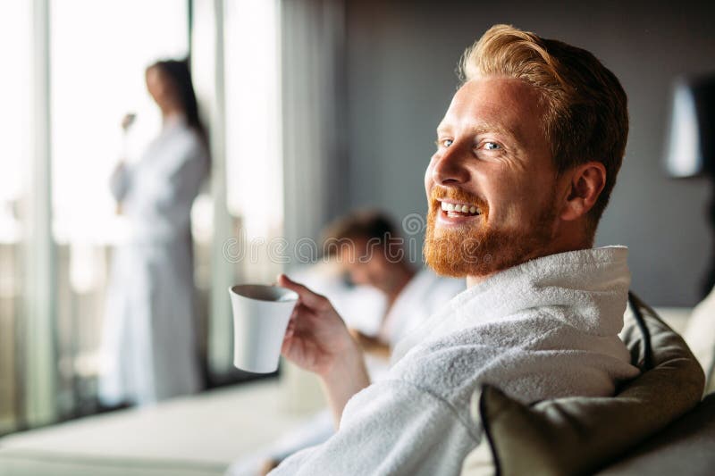 Handsome, Muscular, Young Man Drinking His Morning Coffee in a Hotel ... Handsome, Muscular, Young Man Drinking His Morning Coffee in a Hotel ...