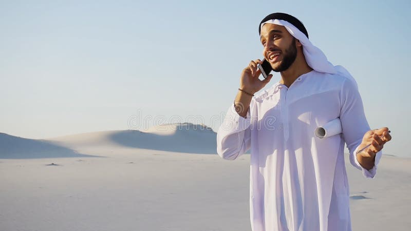 Handsome Muslim Arabian Sheikh Architect Talking on Mobile with Stock ...