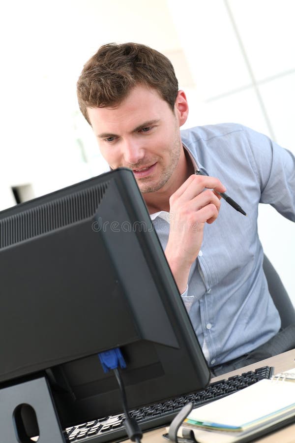 Handsome Office Worker on Computer Stock Image - Image of modern ...