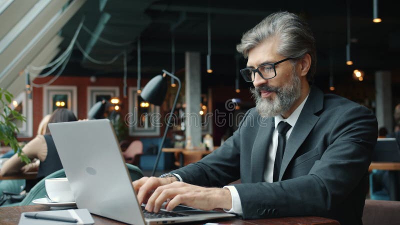 Handsome Office Worker in Formalwear Using Laptop in Cafe at Table ...