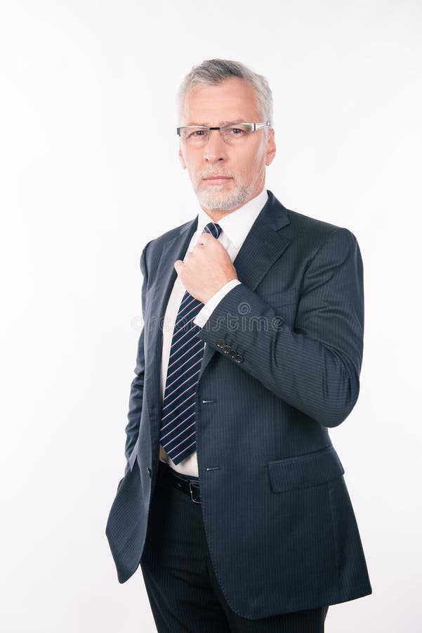 Handsome Old Businessman in a Business Suit with Glasses Stock Photo ...