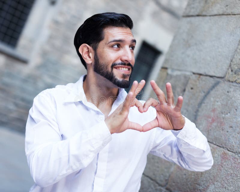 Passionate Man Making Heart Finger Stock Photos - Free & Royalty-Free ...