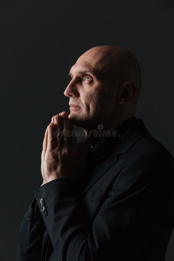 Handsome Peaceful Man in Dark Suit Praying Stock Photo - Image of ...