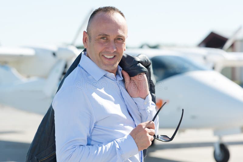 Handsome Pilot in Aviation Looking at Camera Stock Image - Image of ...