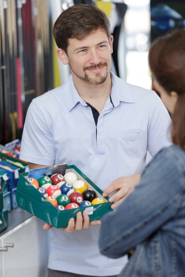Handsome Pool Store Owner Talking To Female Customer Stock Image ...
