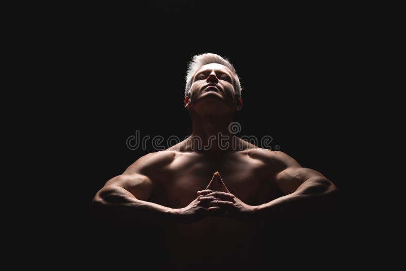 Handsome Power Athletic Man in Dramatic Light. Strong Bodybuilder with ...