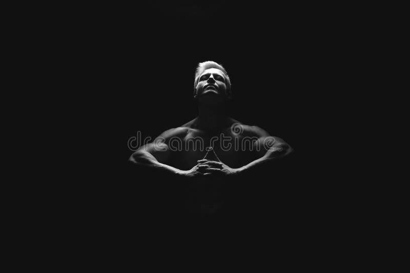 Handsome Power Athletic Man in Dramatic Light. Strong Bodybuilder with ...