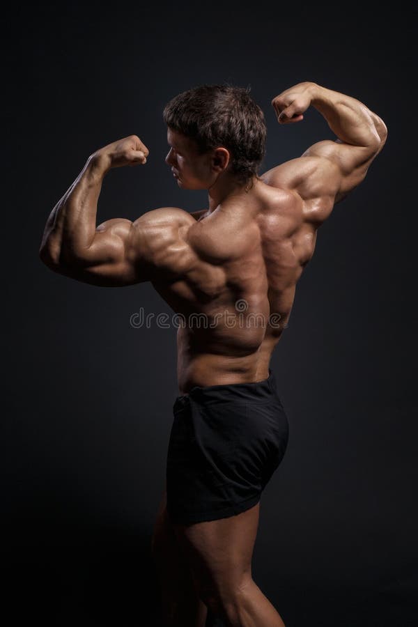 Handsome Power Bodybuilder Showing His Back Stock Photo - Image of ...