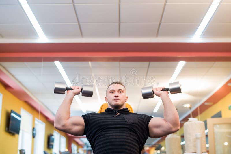 Handsome Powerful Athletic Man Doing Barbell Shoulder Press Exercise ...