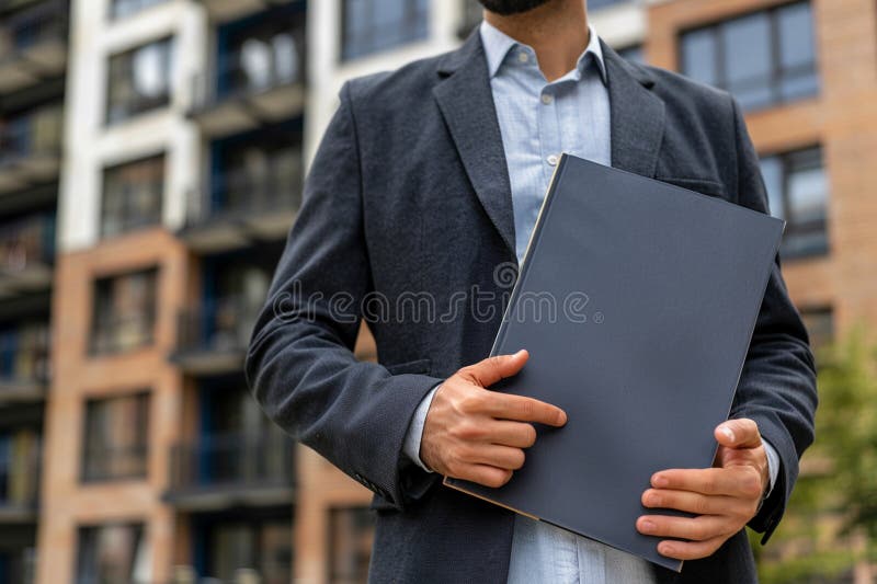 Handsome Real Estate Agent Holds a Folder in Hands Stock Illustration ...