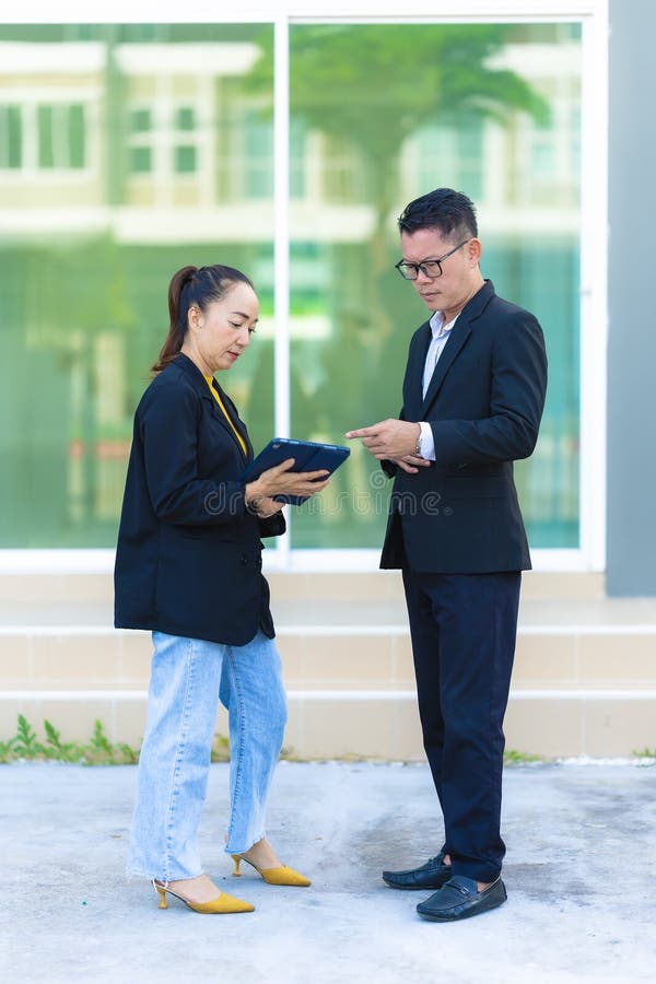 Handsome Real Estate Agent Holding Banner House for Sale. House with ...