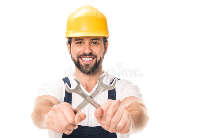 Handsome Repairman Holding Wrenches and Smiling at Camera Stock Photo ...