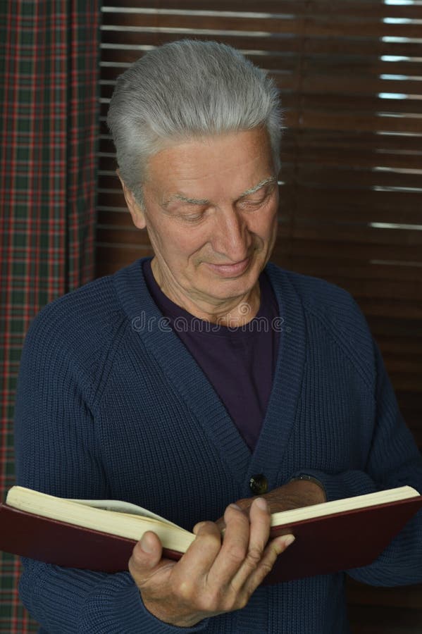 Handsome retired man stock image. Image of male, book - 62671257