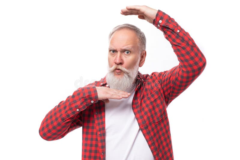 Handsome 60s Retired Man with White Beard and Mustache Making a Face ...