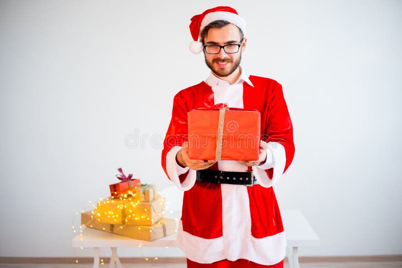 Handsome Santa Claus Giving Presents Stock Photo - Image of male ...