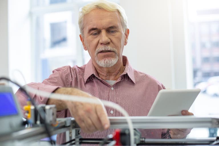 Handsome Senior Man Practicing at Running 3D Printer Stock Photo ...