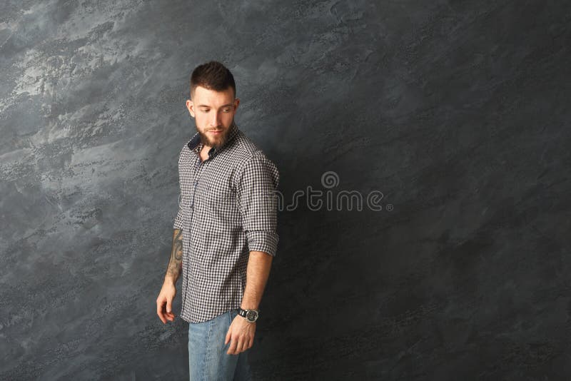 Handsome Serious Tattooed Man Looking Back Stock Photo - Image of ...