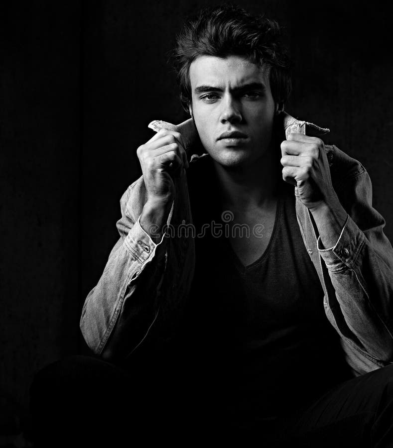 Handsome Male Model Posing In Fashion Suit And White Style Stock Image