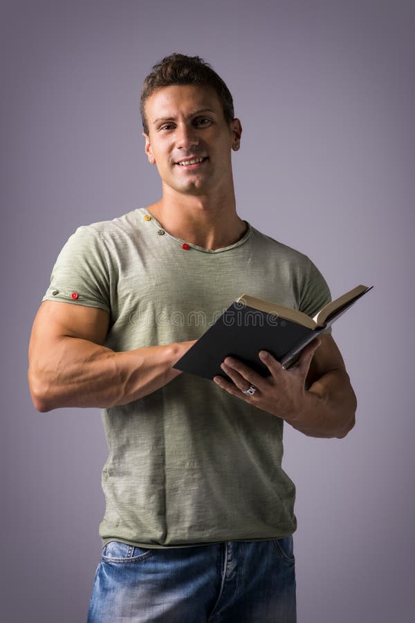 Handsome Muscular Man Reading Book Stock Photo - Image of strong ...