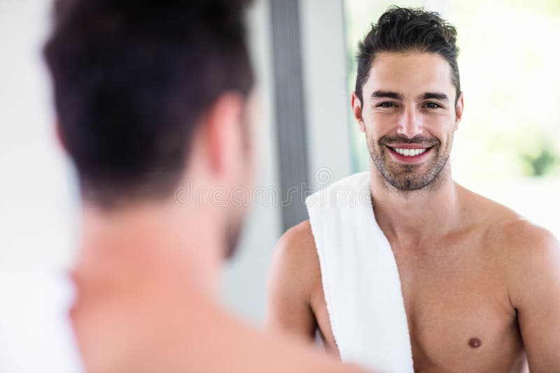Handsome Shirtless Man Looking in the Mirror Stock Image - Image of ...