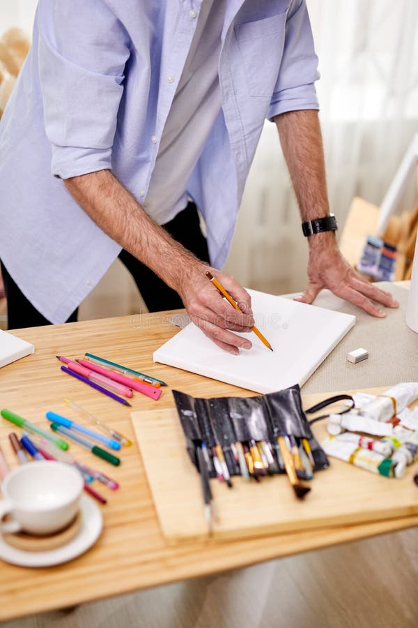 Handsome Skilled Painter Drawing Sketch on Sheet with Pencil Stock ...