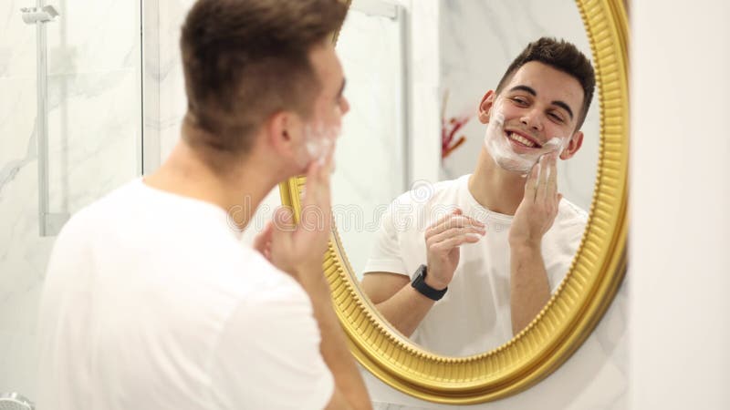 Handsome Man Washing His Naked Muscular Body Gels For Men With Neutral