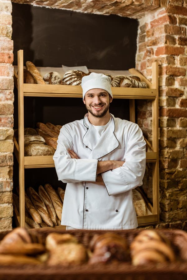 Handsome Smiling Baker with Crossed Arms Standing Stock Image - Image ...
