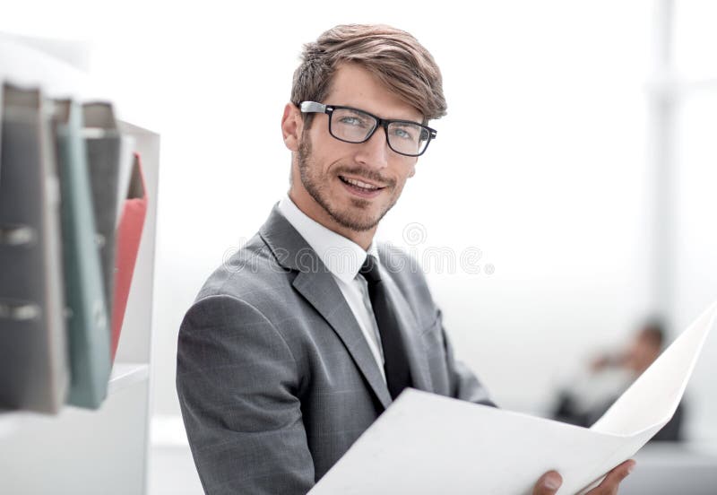 Handsome Smiling Businessman Looking at Documents Stock Image - Image ...
