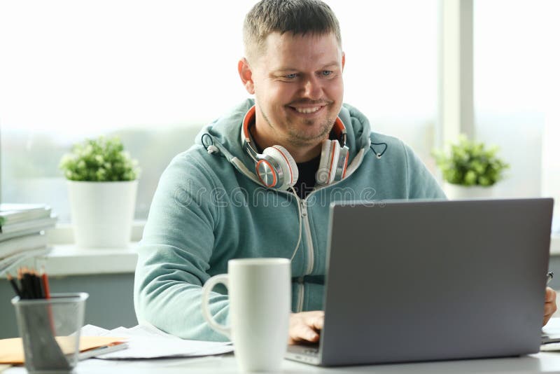 Handsome Smiling Male Student Using Online Stock Image - Image of ...