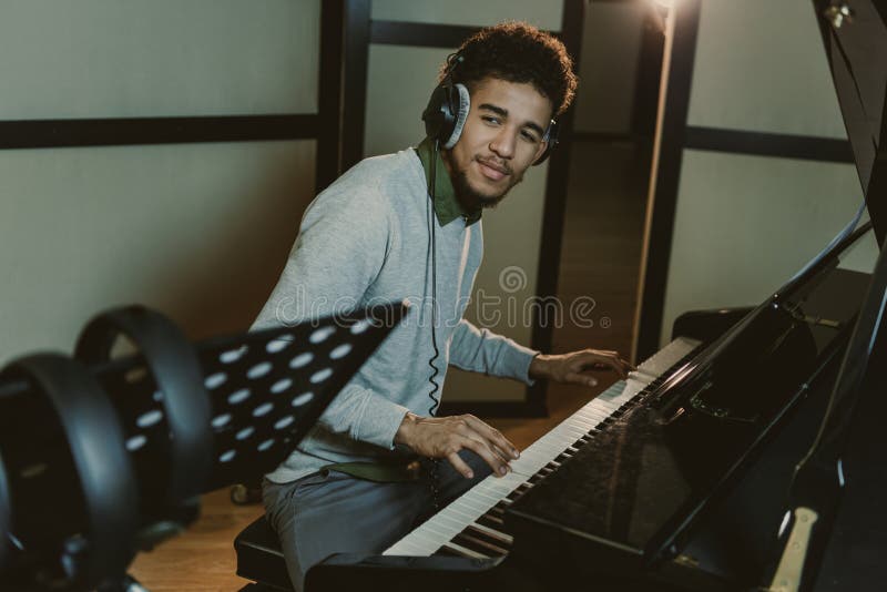 Smiling Piano Teacher stock image. Image of instrument - 1721967