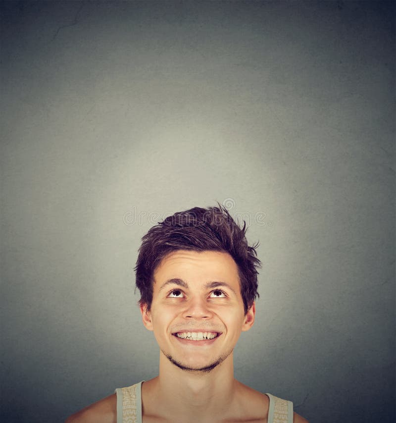 Handsome Smiling Young Man Looking Up Stock Photo - Image of close ... Handsome Smiling Young Man Looking Up Stock Photo - Image of close ...