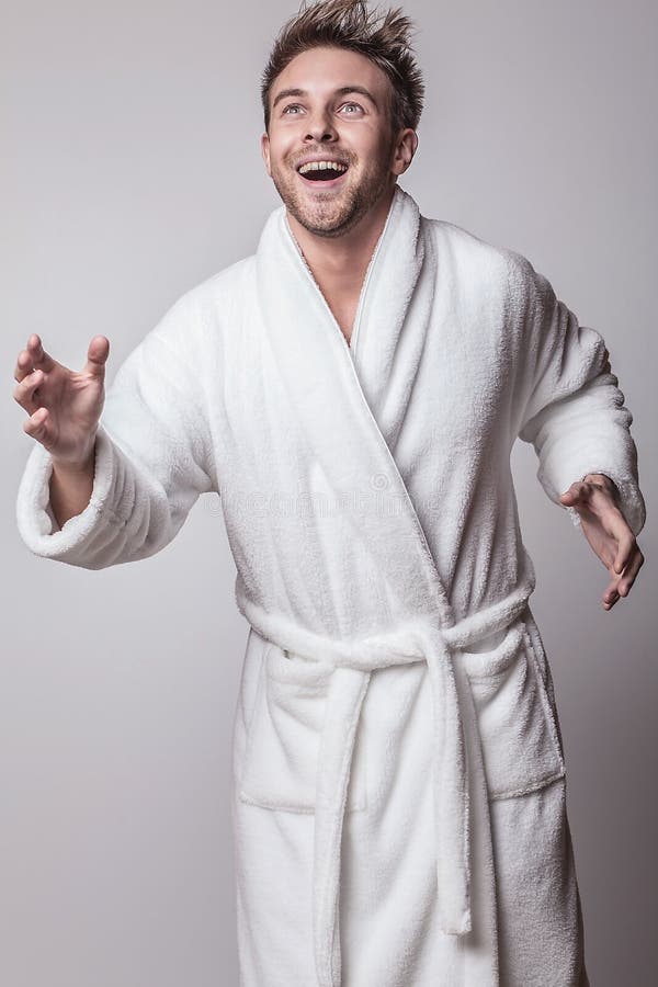 Handsome Smiling Young Man in Luxurious Bathrobe. Stock Image - Image ...