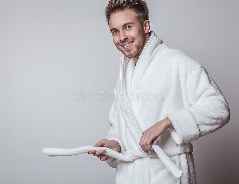 Handsome Smiling Young Man in Luxurious Bathrobe. Stock Image - Image ...