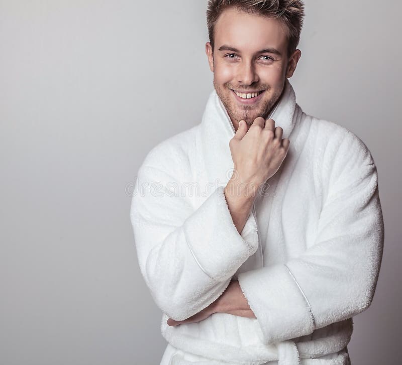 Handsome Smiling Young Man in Luxurious Bathrobe. Stock Image - Image ...