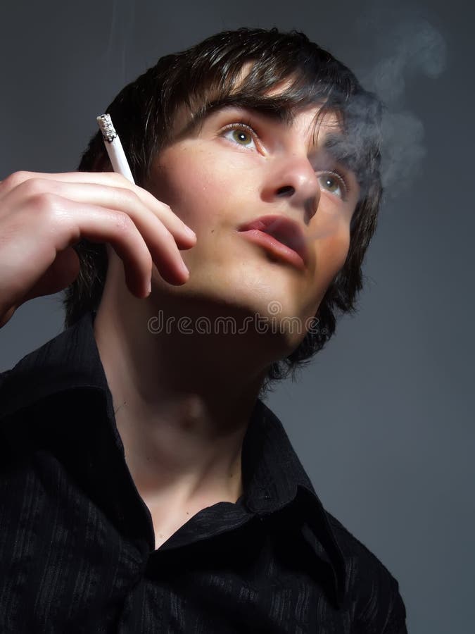 Handsome smoker stock image. Image of charming, beautiful - 5304757