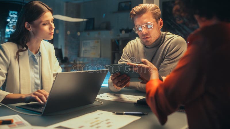 Handsome Software Developer Leading an Office Meeting in Creative ...