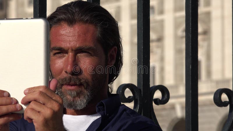 Handsome Spanish Male Using Tablet Stock Image - Image of spain, device ...