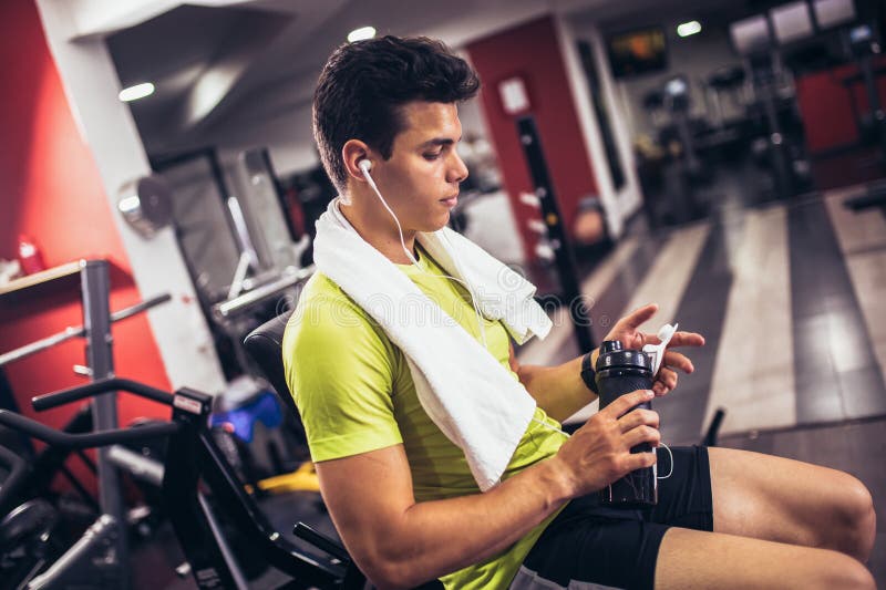 Handsome Man Resting, Having Break Drinking Water after Doing Exercise ...