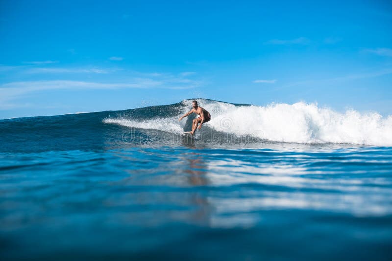 Handsome Sporty Man Riding on Waves on Sunny Day Stock Photo - Image of ...