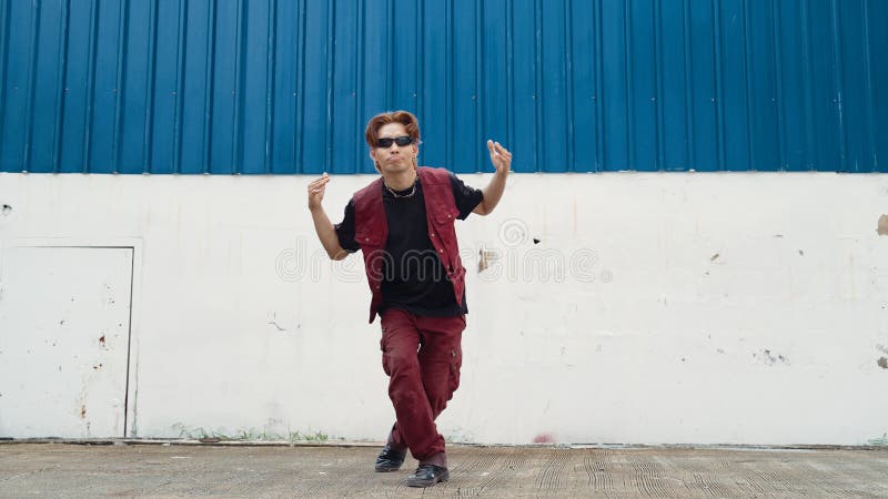 Handsome Street Dancer Practicing Break Dancing at White Back Ground ...