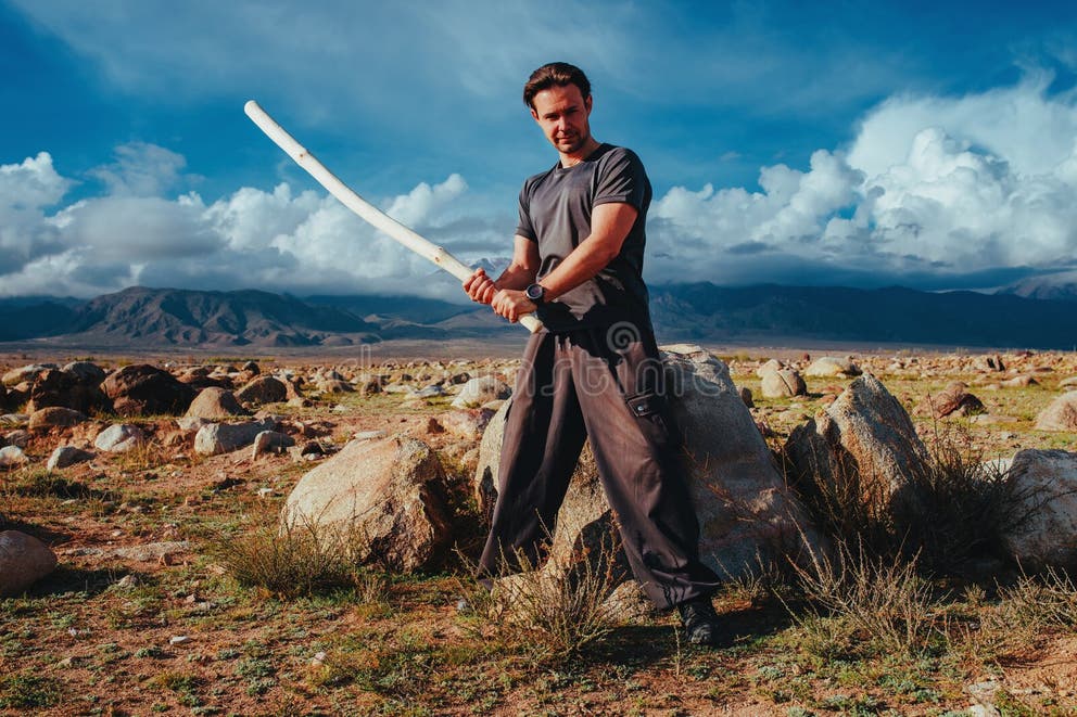 Handsome Strong Man with Fighting Stick Stock Photo - Image of ...