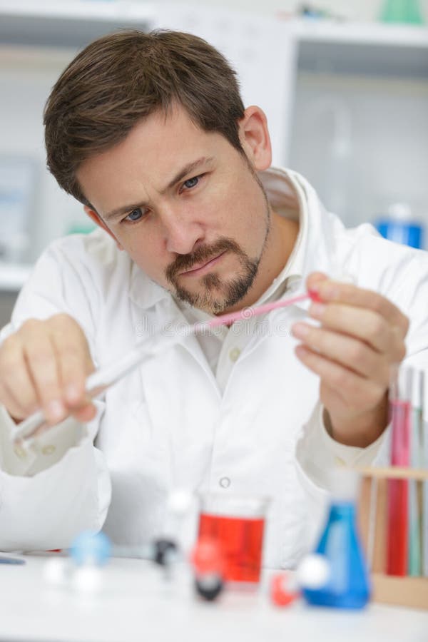 Handsome Student Chemistry Working with Chemicals Stock Image - Image of microbiology ...