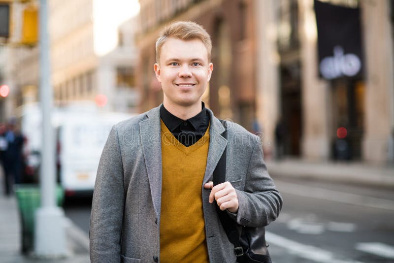 Handsome Student Man with Backpack Stands on City Street Looking at ...